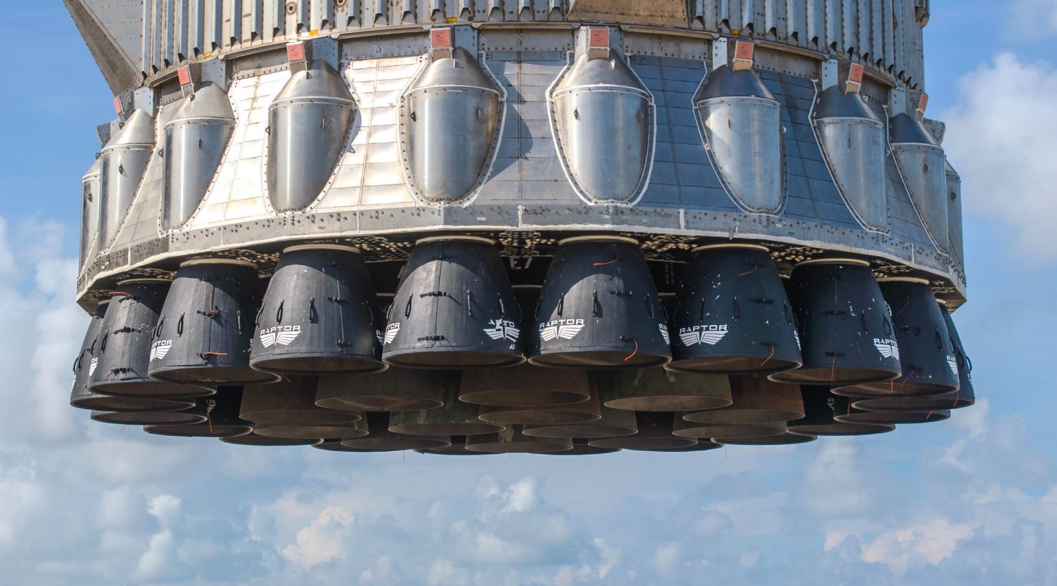 Exciting photos of 33 Starship Raptor engines