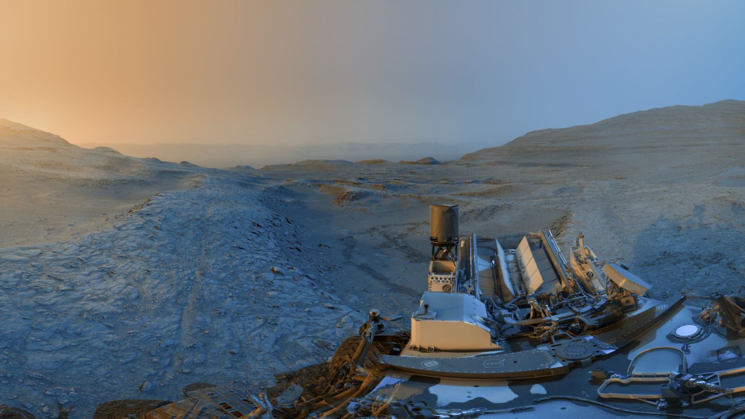 Breathtaking sunset on Mars from the top of a mountain
